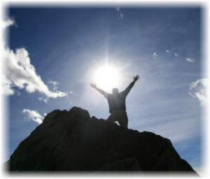 rejoiceful person at top of mountain (cropped 343x293) with 10px fade ...